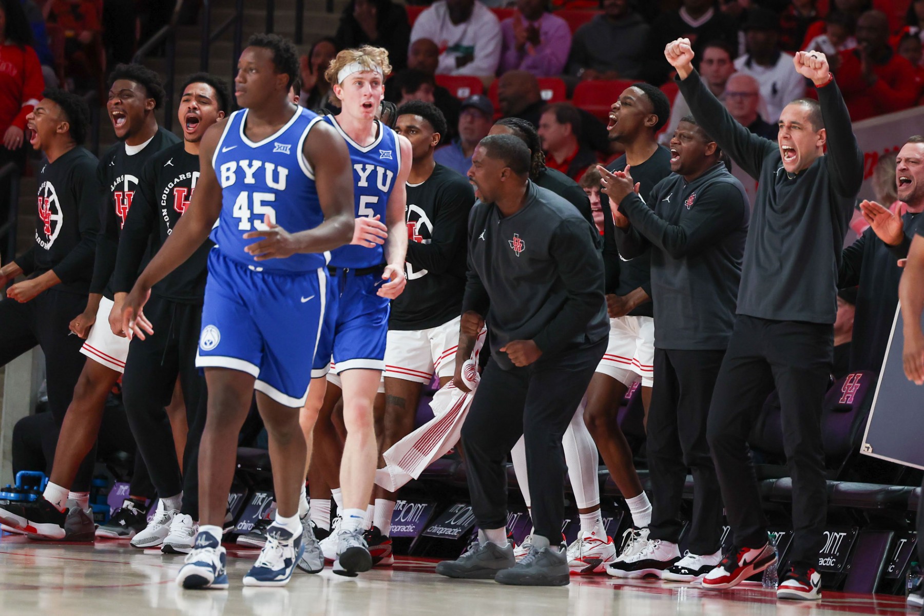 The UH bench celebrates a BYU turnover » GoCoogs.com