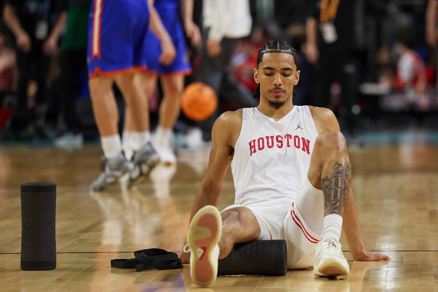 pre-game stretches for Milos » GoCoogs.com